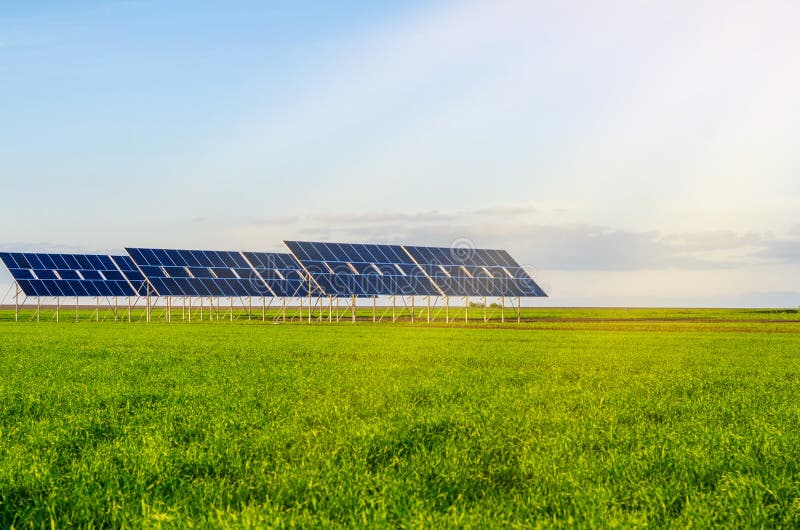 Photovoltaic Ecological Modules on Green Grass Valley Against of Sun ...