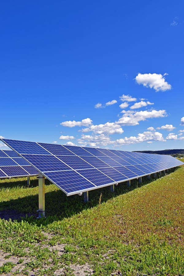 Solar Panels on Field Under Clear Blue Sky Stock Image - Image of ...