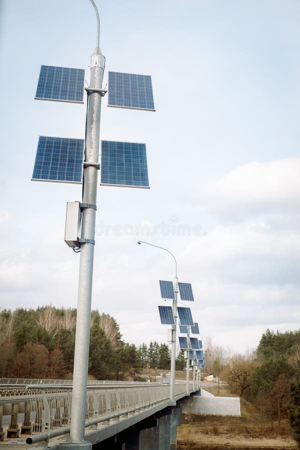 Solar Panels in the Forest. Bridge and River in Spring Stock Photo ...