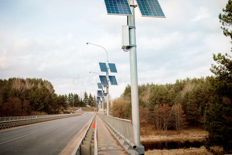 Solar Panels in the Forest. Bridge and River in Spring Stock Image ...