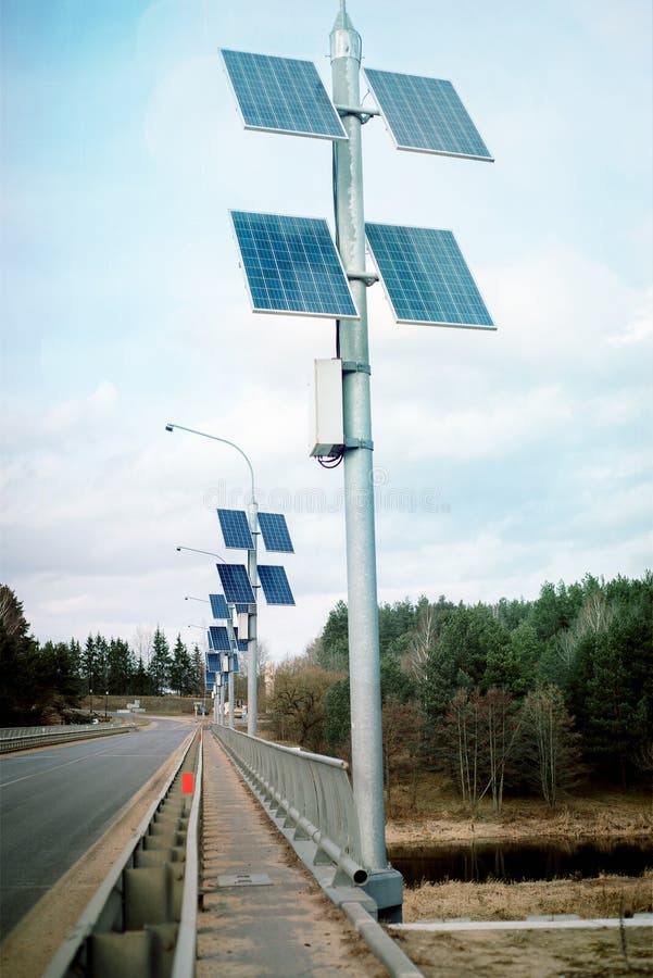 Solar Panels in the Forest. Bridge and River in Spring Stock Image ...
