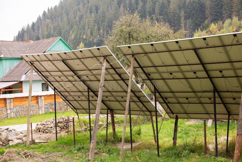 Solar panels in a garden stock photo. Image of energy - 233598134