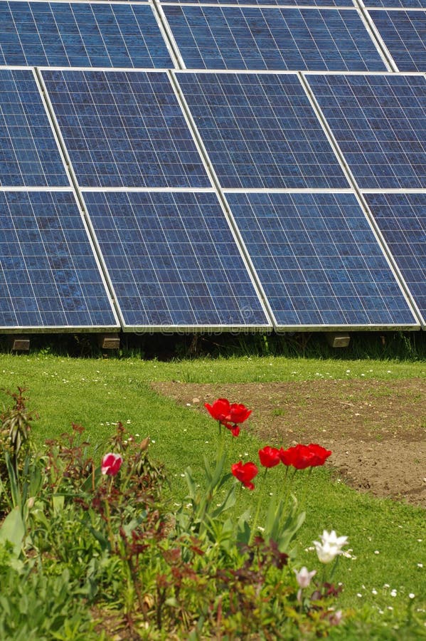 Solar panels in the garden stock photo. Image of energy - 40201762