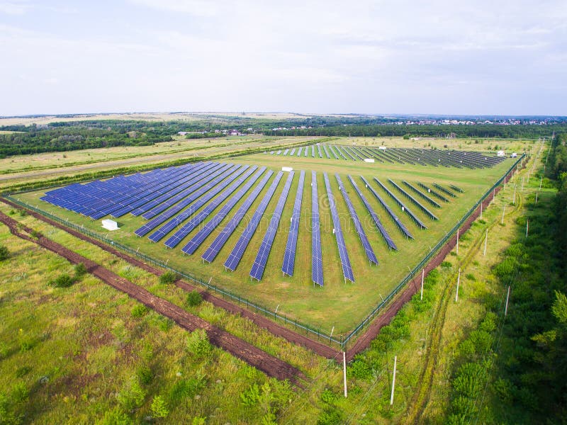 Solar Panels on Green Grass with Blue Sky Stock Image - Image of field ...