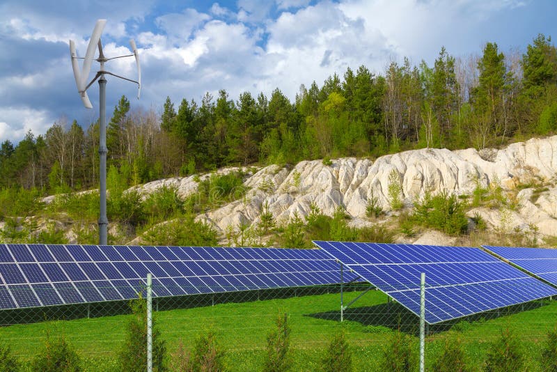 Solar Panels On Green Grass Stock Photo - Image of panels, renewable ...