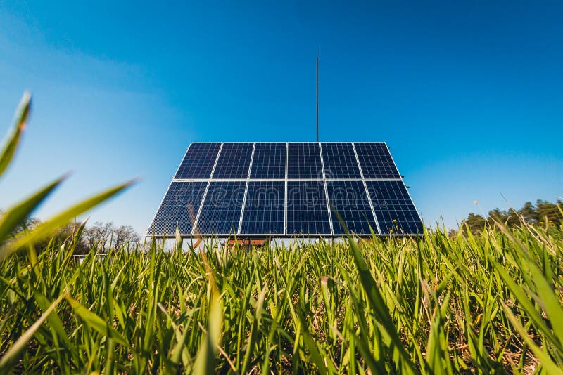Solar Panels and Green Grass Stock Photo - Image of innovation ...