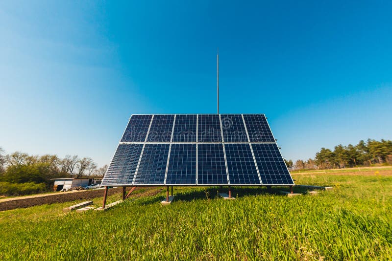 Solar Panels and Green Grass Stock Photo - Image of innovation ...