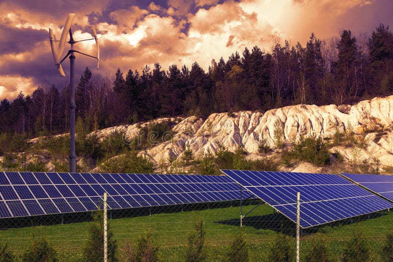 Solar Panels on Green Grass at Sunset Stock Image - Image of equipment ...