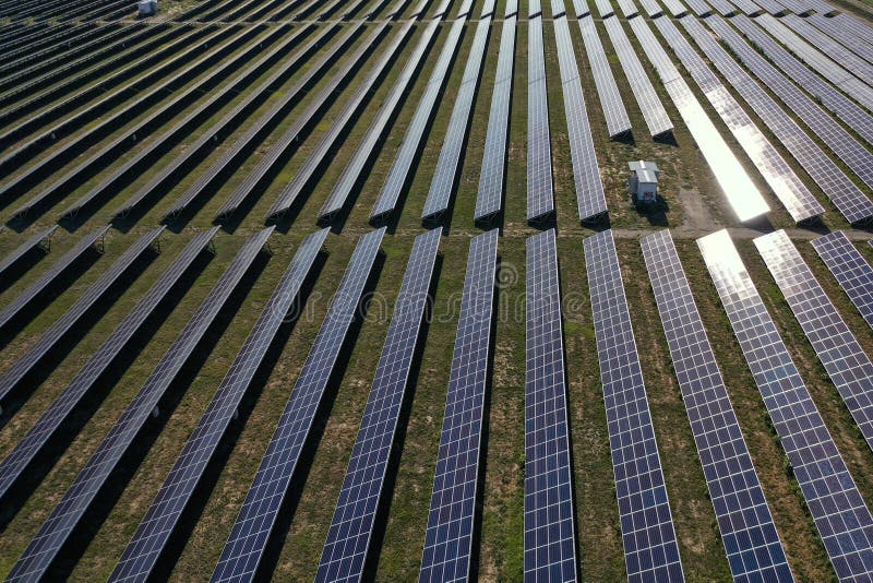Solar Panels on a Green Meadow Stock Photo - Image of soil, solar ...