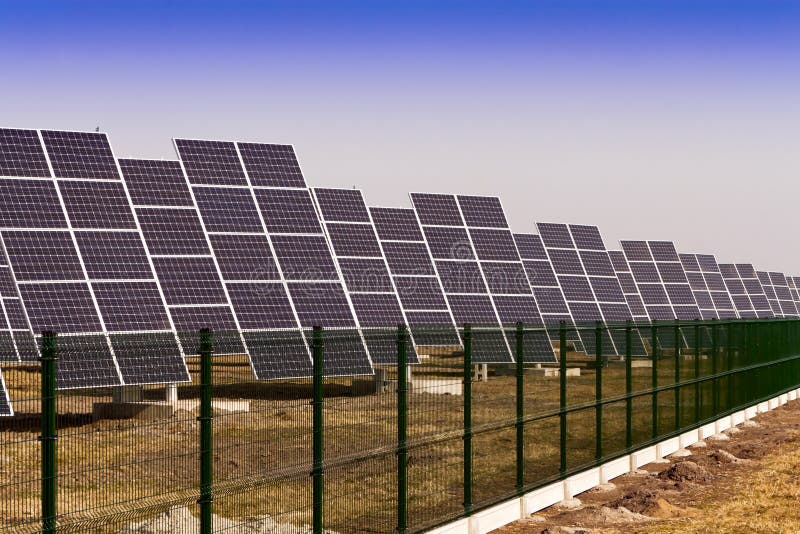 Solar Panels Installed on the Field. Stock Image - Image of electric ...