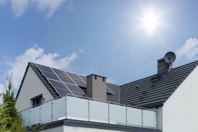 Solar Panels on Modern House Roof a Bright Sunny Sky Stock Image ...