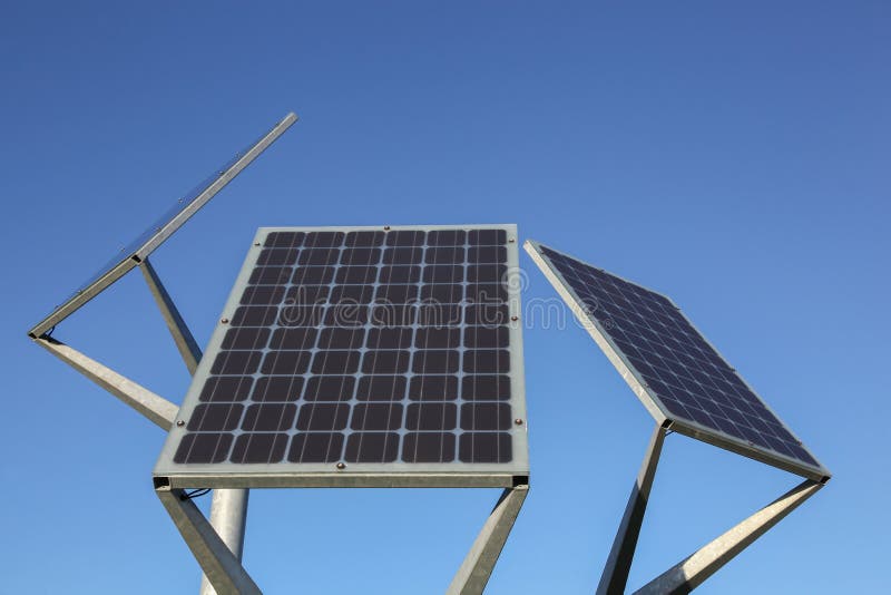 Solar panels on a pole stock photo. Image of powered - 63881598