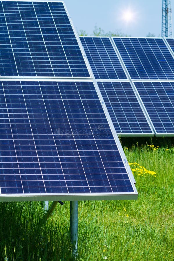 Solar Panels on Green Grass Stock Photo - Image of equipment, panels ...