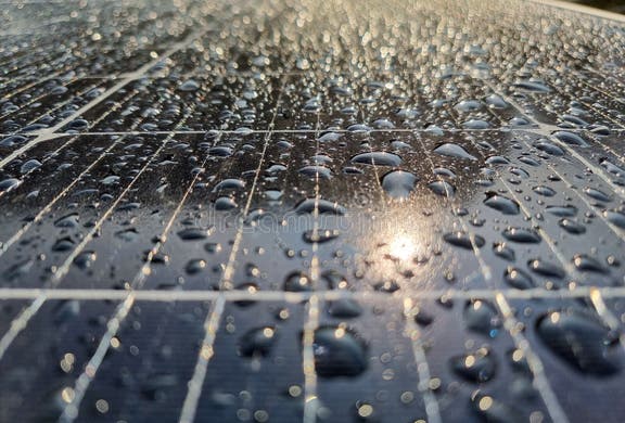 Solar Panels with Rain Drops on the Surface and Sun Reflection Stock ...