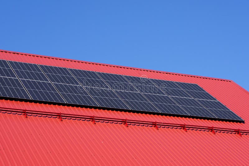 Solar Panels on a Red Roof of the Modern House Stock Photo - Image of ...