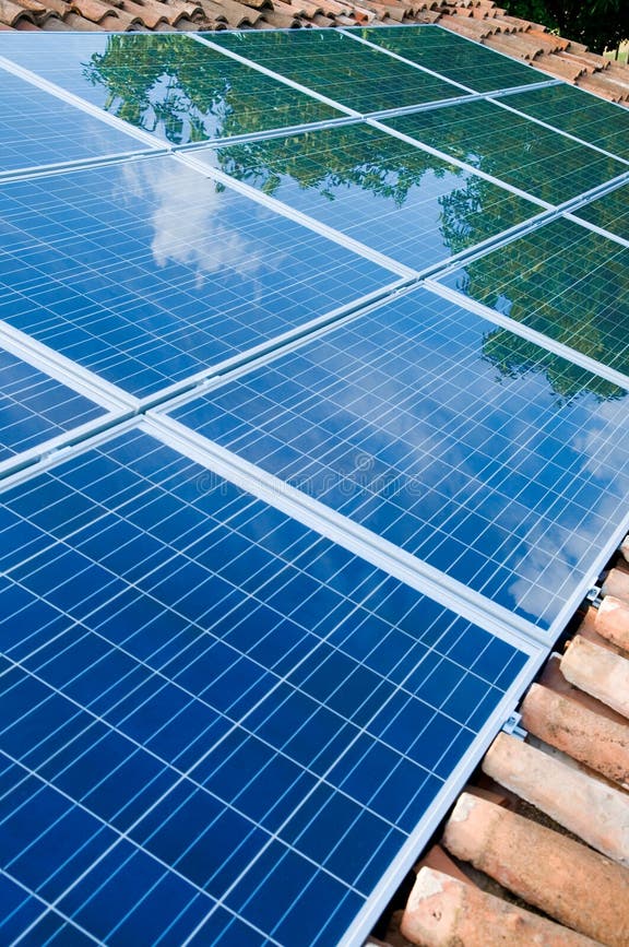 Solar Panels on Roof with Green Reflection Stock Photo - Image of ...