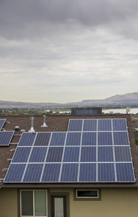Solar Panels on Roof of House on a Cloudy Day Stock Photo - Image of ...
