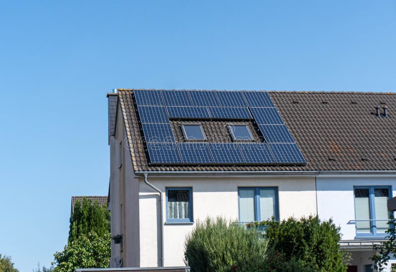 Solar Panels on a Roof of a House, Blue Sky Stock Image - Image of ...
