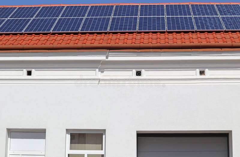 Solar Panels on the Roof of a White Building Stock Image - Image of ...