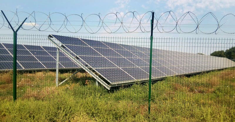 Solar Panels Behind the Grid Stock Photo - Image of endless, technology ...