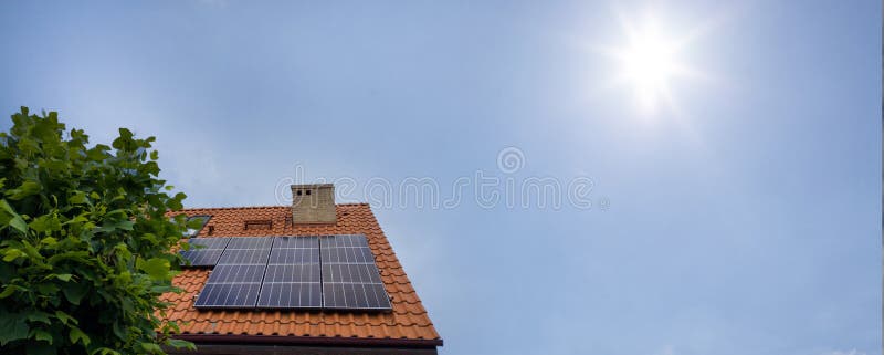 Solar Panels on Tiled Rooftop with Sun. Copy Spacr Stock Photo - Image ...