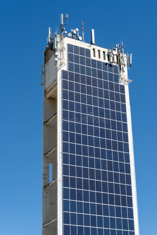 Solar panels on a tower stock image. Image of electricity - 252220143