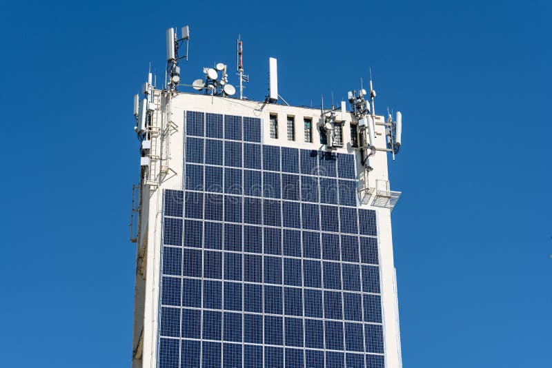 Solar panels on a tower stock image. Image of landscape - 252220209