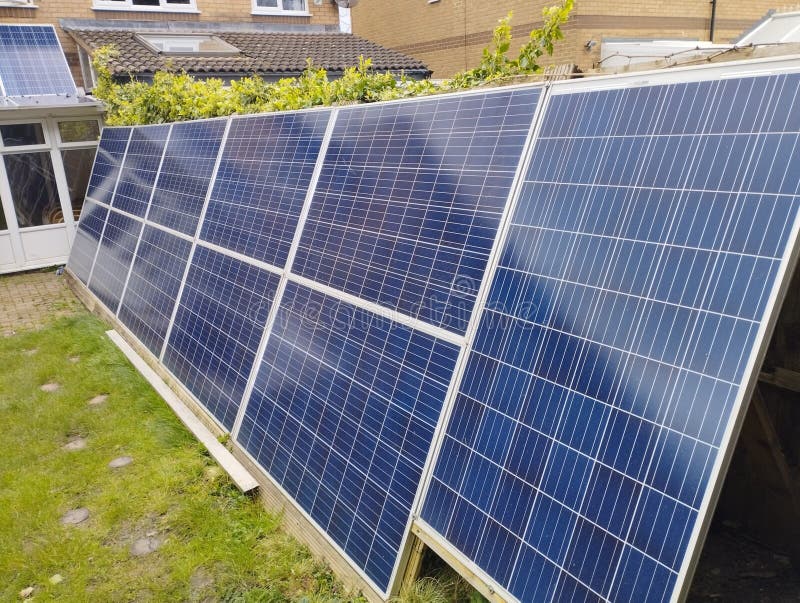 Solar Panels Vertical Along Fence Stock Photo - Image of fence, panels ...