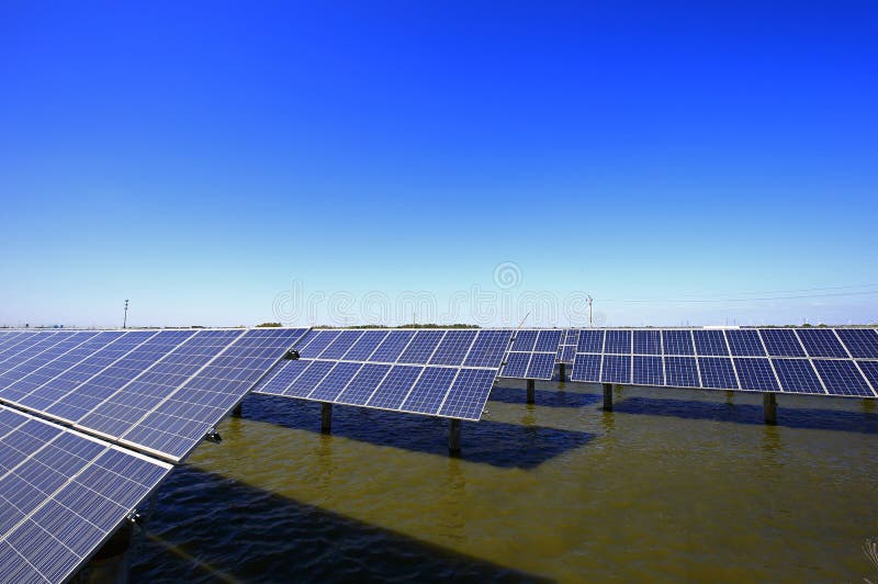 Solar panels on the water stock photo. Image of ecology - 216747420