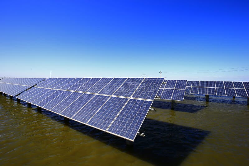 Solar panels on the water stock photo. Image of ecological - 216747430