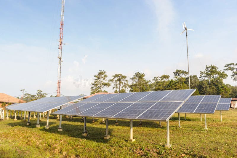 Solar Panels and Wind Turbine with Blue Sky. Stock Photo - Image of ...