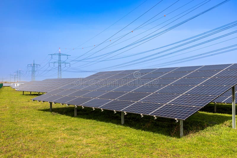 Solar park with pylon stock image. Image of electricity - 314151937