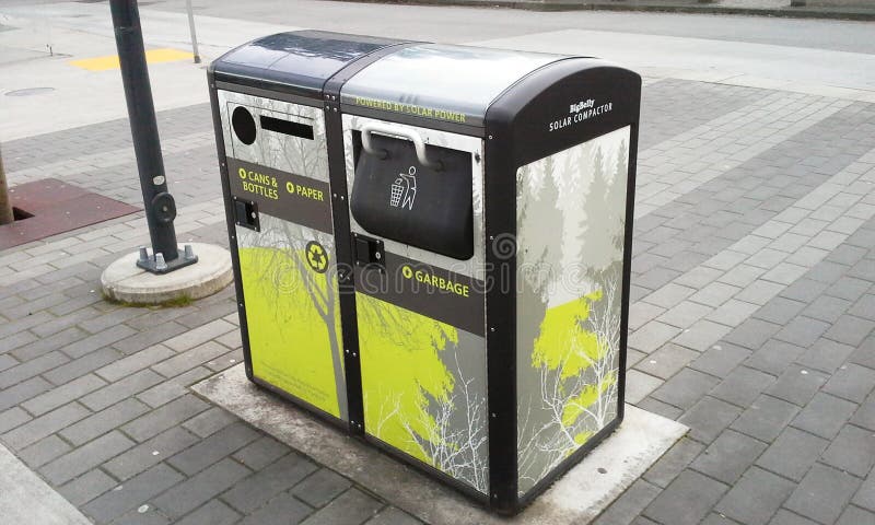 Solar Power Garbage Bins editorial stock photo. Image of energy - 52177063