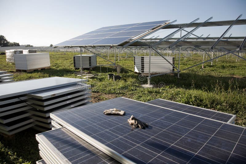 Solar Power Plant Construction Stock Photo - Image of steel, clouds ...