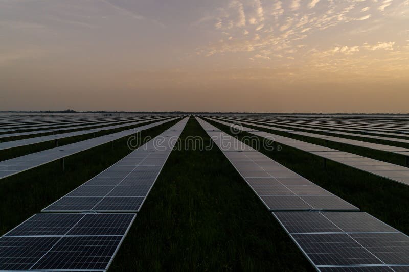 Solar Power Plant with Lots of Energy Modules and Panels Lined Up Along ...