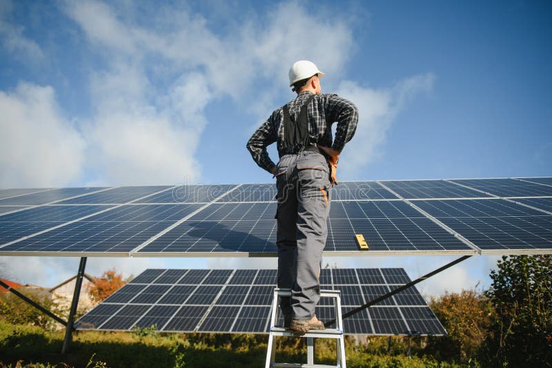 Solar Power Plant Worker Checks the Condition of the Panels Stock Photo ...