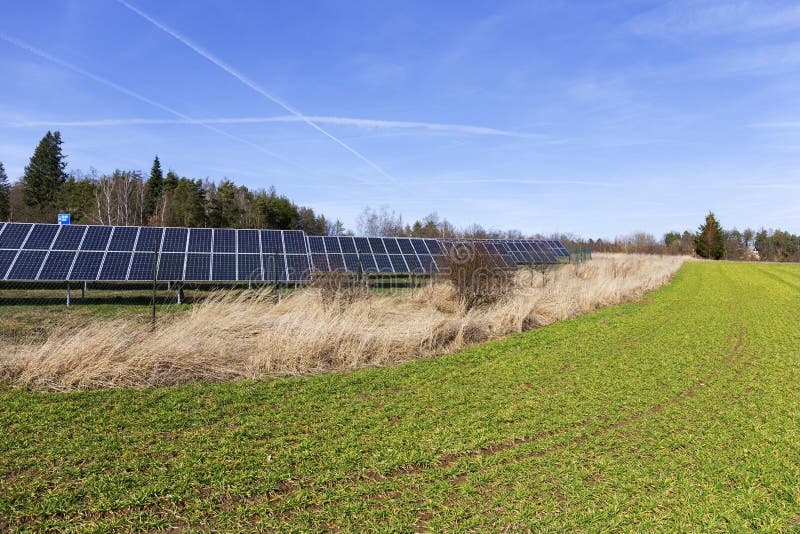 Solar Power Station on the Early Spring Meadow Stock Image - Image of ...