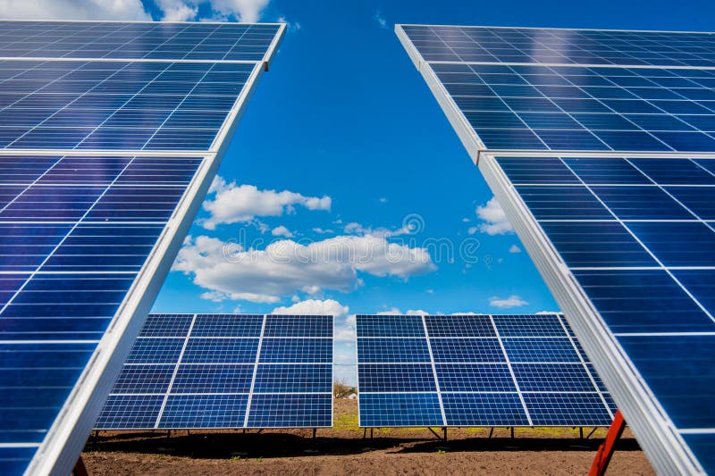 Solar Power Station Panels with Reflection of Clouds and Sky Stock ...