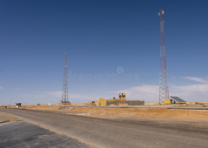 Solar Powered Communication Towers and a Checkpoint Along a Highway in ...