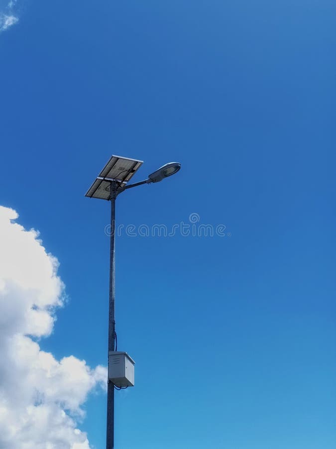 Solar Powered Light at the Harbour Stock Photo - Image of harbour, blue ...