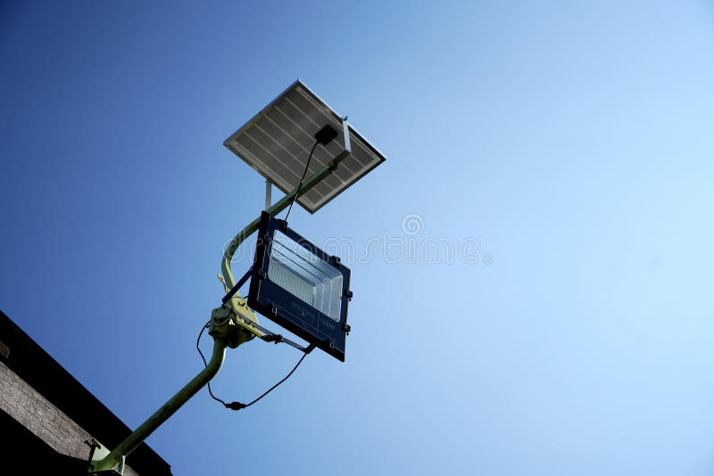 Solar powered spotlight stock photo. Image of blue, brand - 359582670