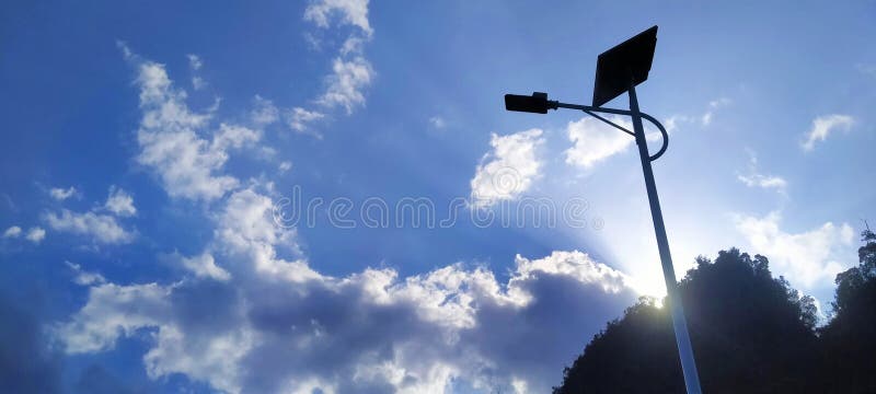A Solar Powered Street Lamp Post and Very Blue Clouds Stock Image ...