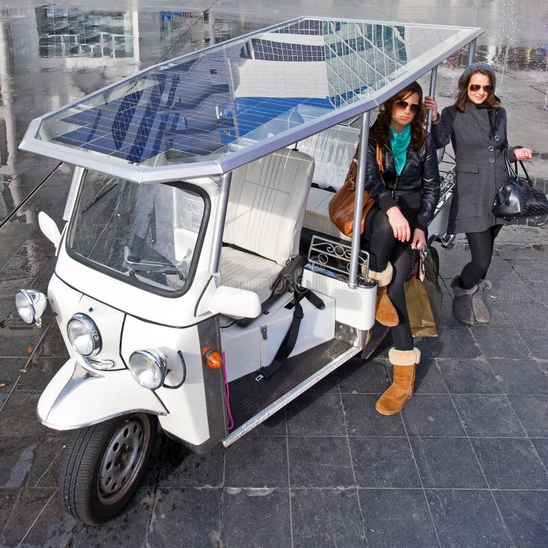 Solar powered tuc tuc stock image. Image of driver, beach - 13126143
