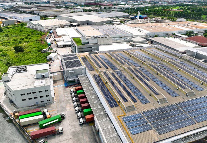Solar-powered Warehouse Facility with Freight Trucks at Loading Docks ...