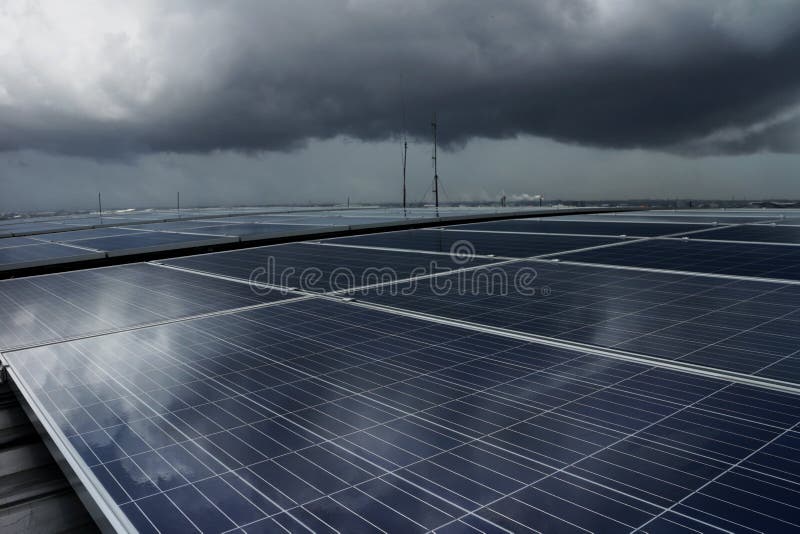 Solar PV Rooftop Under Storm Cloud Stock Photo - Image of kits, rooftop ...