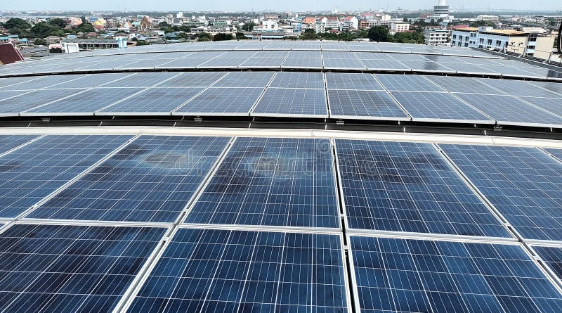 Solar Rooftop System on Curve Roof in the City Area Stock Image - Image ...