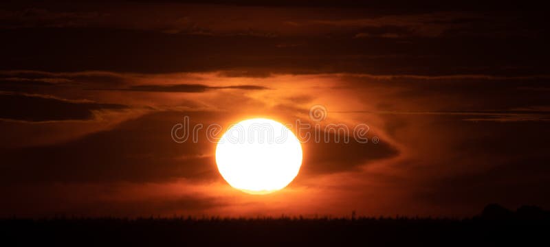 Solar Splendor: a Detailed View of the Evening Sun Stock Image - Image ...