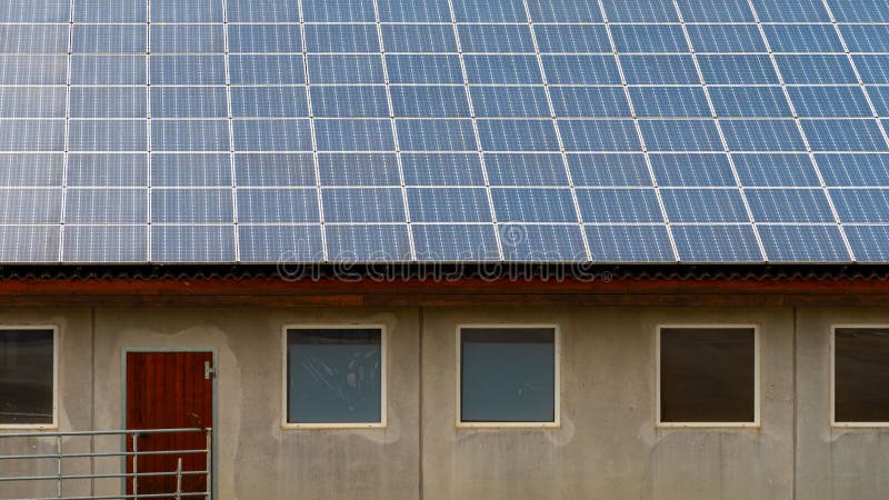 Solar System Panels on the Roof of a Building Stock Photo - Image of ...