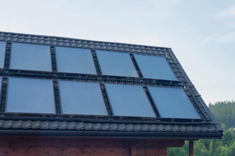 Solar Thermal Heating System for Hot Water on Grey Roof. Stock Photo ...