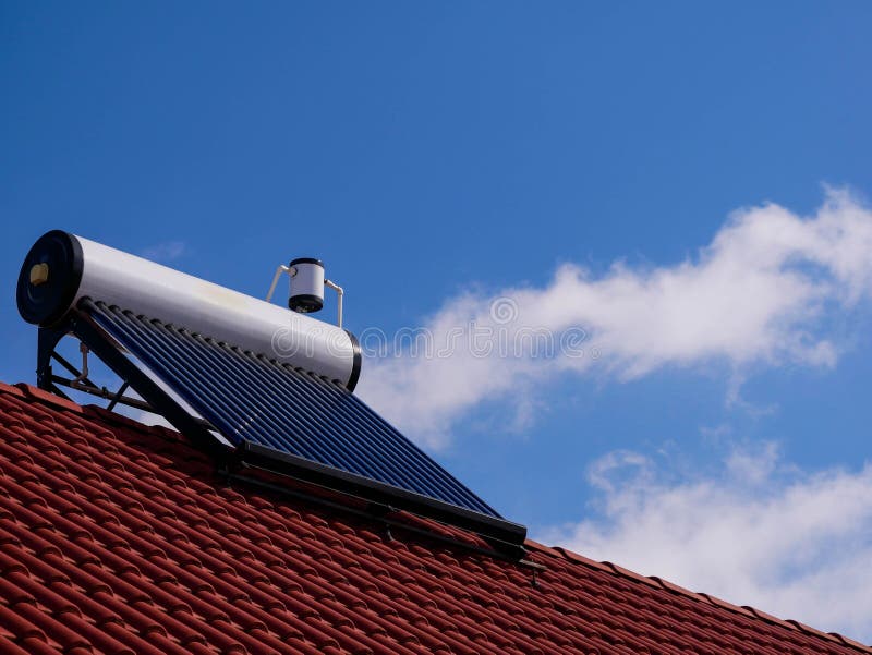 Solar Water Heater Boiler on Rooftop, Blue Sky with White Clouds Stock ...